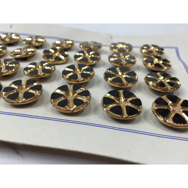 Botones antiguos en tono dorado y negro. Miden 1.6 cm de diámetro.