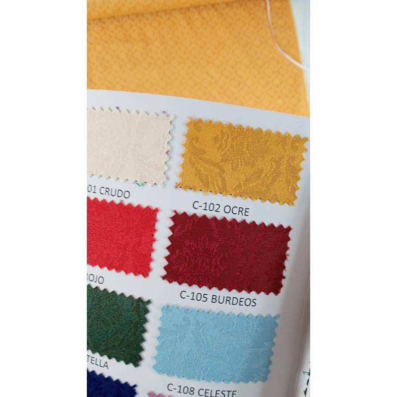 Tejido adamascado color amarillo ocre